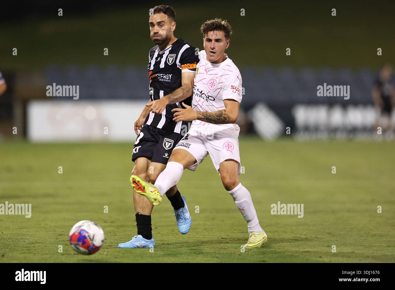 Anthony Cáceres of the Bulls passes punder pressure from Alessandro ...