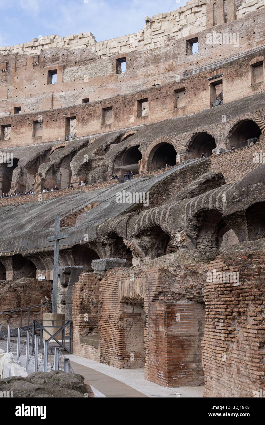 Interior view of the Colosseum in Rome showing arches, brick walls and ...