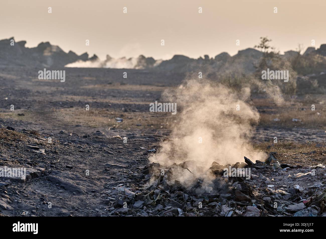 Toxic smoke from underground fires in open cast coal mine Stock Photo ...