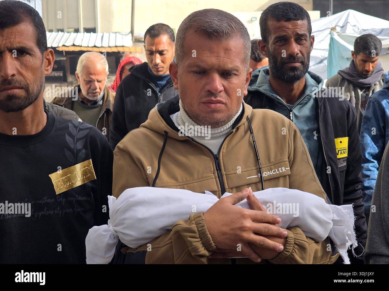 Palestinians mourn the body of infant Sajoud Alyyan at Nasser Medical ...