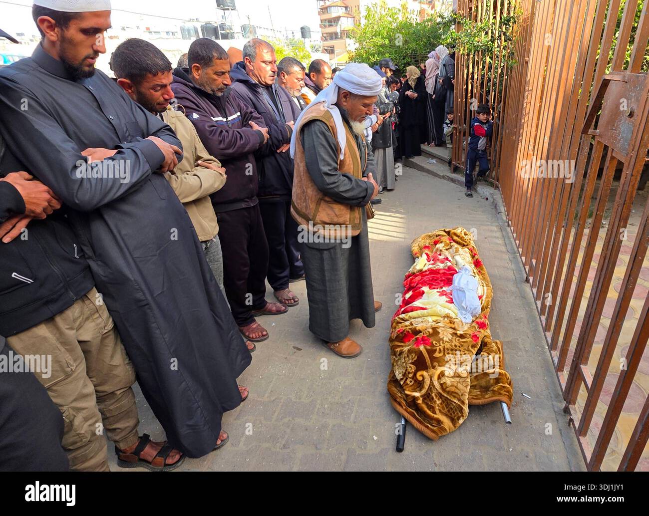Palestinians mourn the body of infant Sajoud Alyyan at Nasser Medical ...
