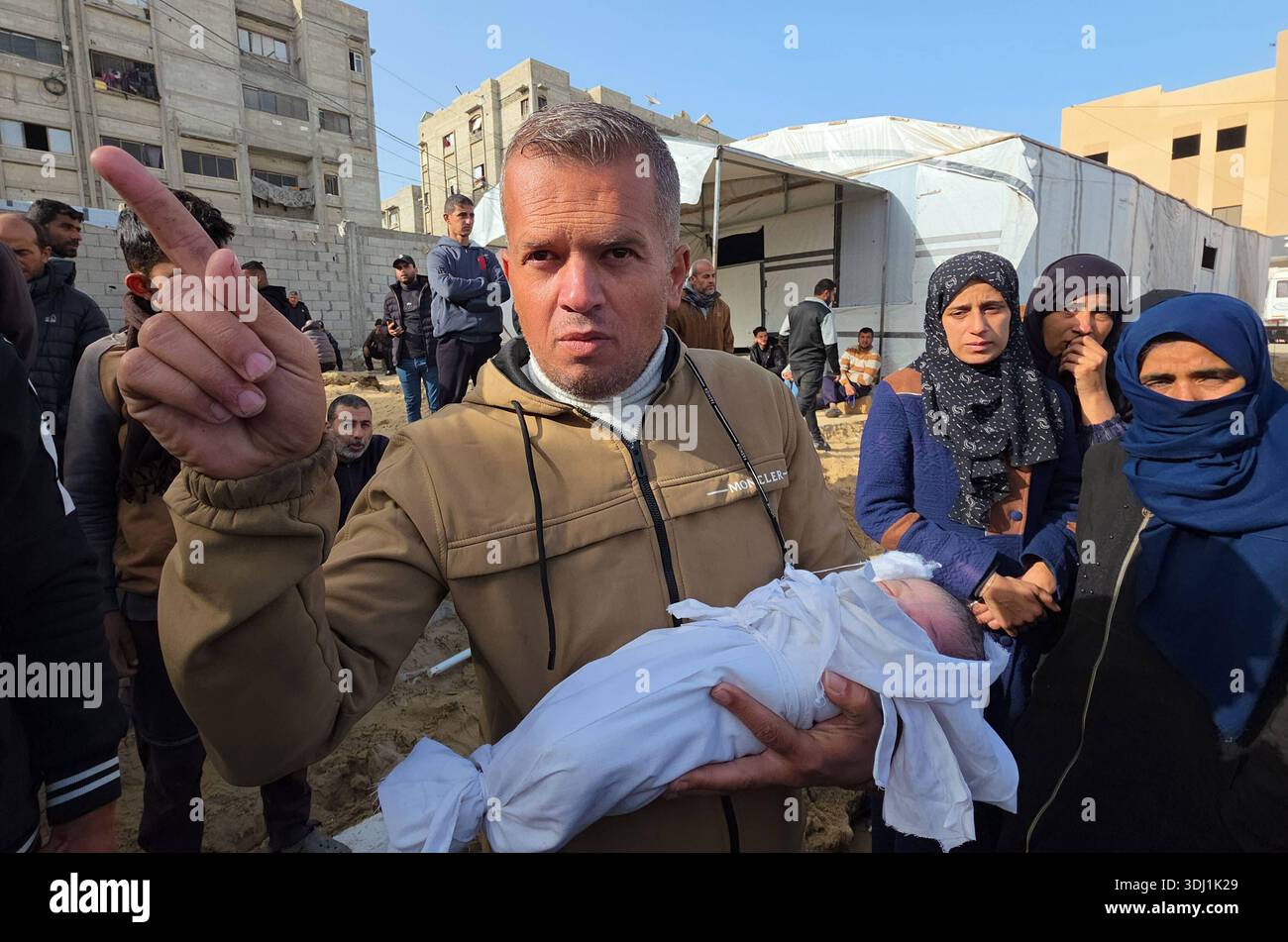 Palestinians mourn the body of infant Sajoud Alyyan at Nasser Medical ...