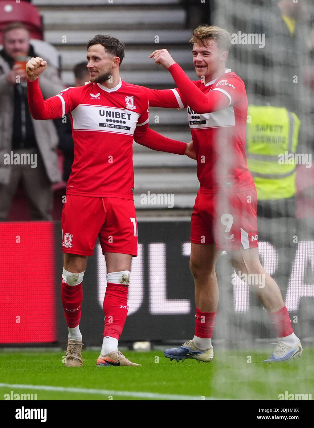 Middlesbrough's Alan Browne (left) celebrates with Tommy Conway after ...