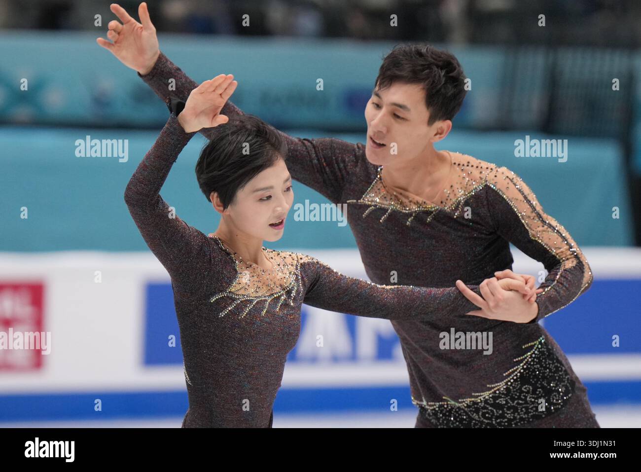Tae Ok RYOM and Kum Chol HAN of North Korea perform in the pair's free ...