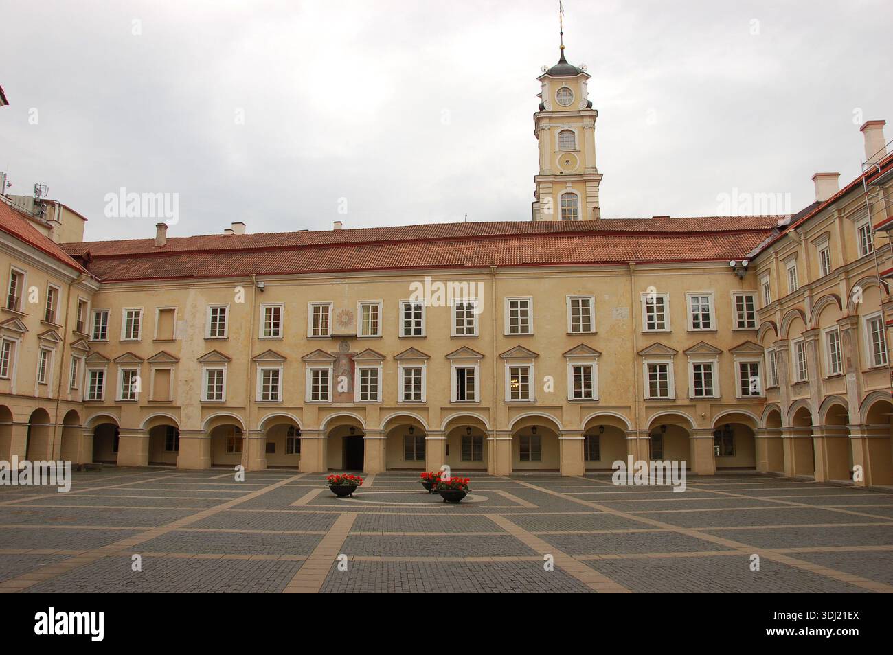 Historic courtyard of Vilnius University with classical yellow ...