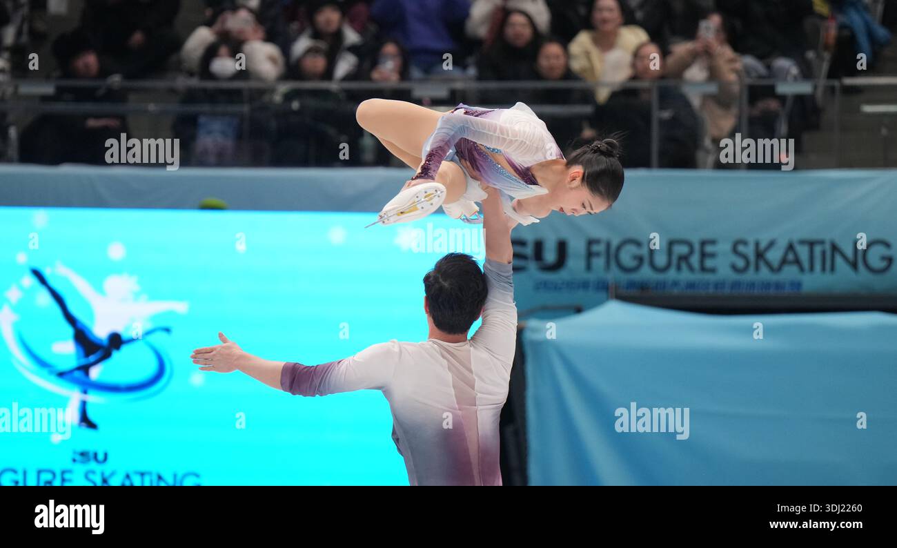 Jiaxuan ZHANG and Yihang HUANG of China perform in the pair's free ...