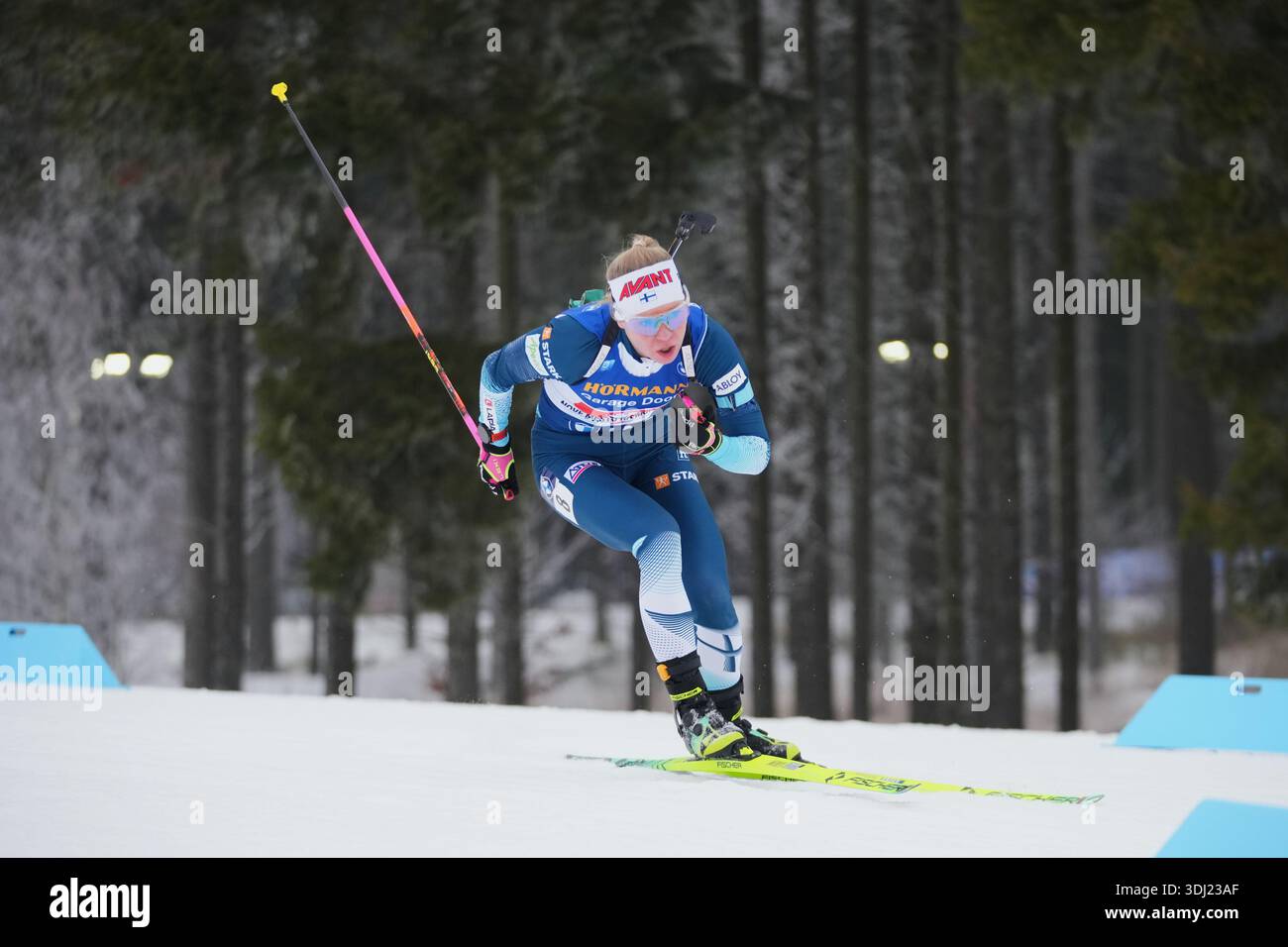 Suvi Minkkinen, of Finland, competes in the single mixed relay race at ...