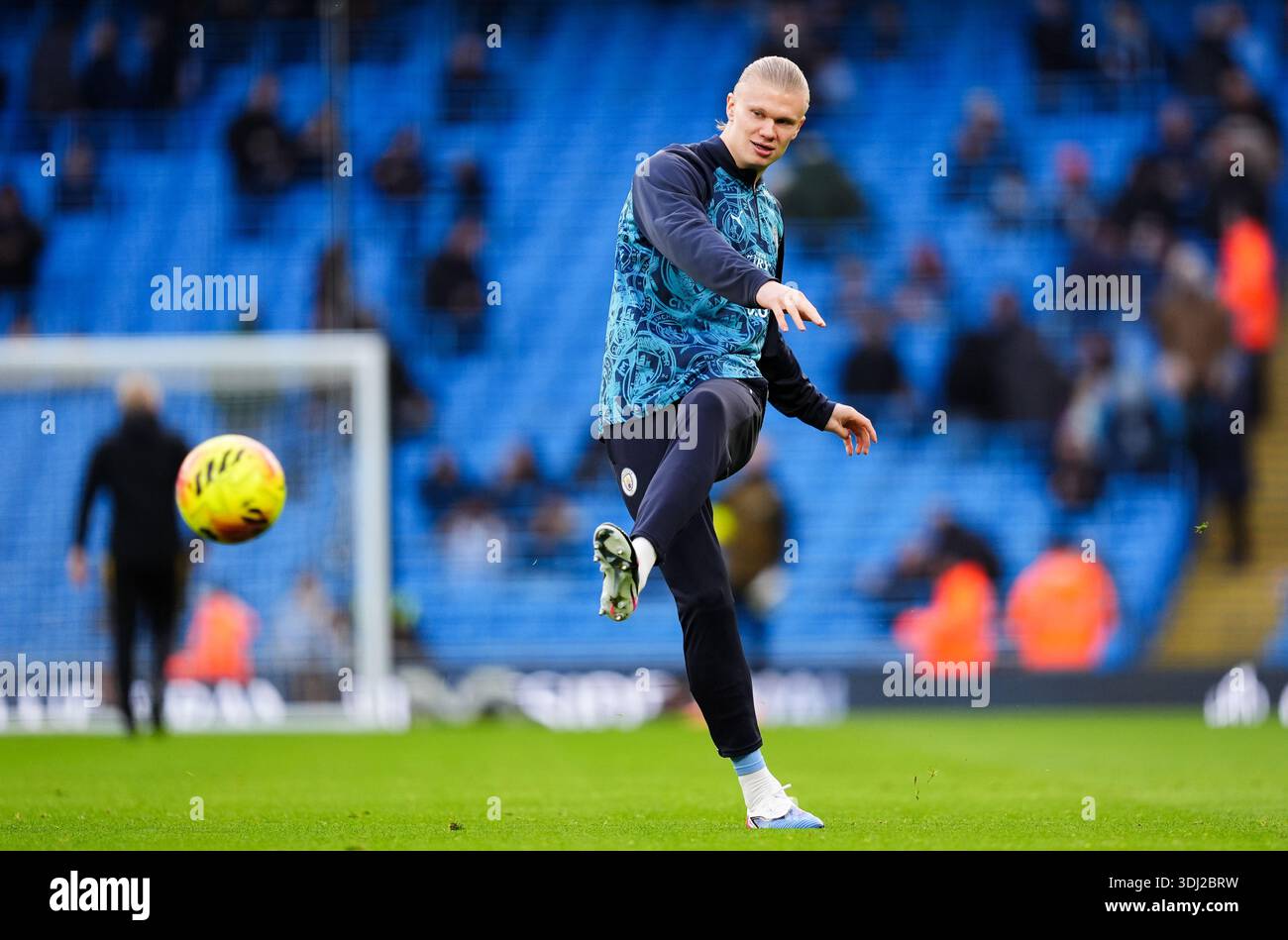 Manchester City's Erling Haaland, who starts on the bench, warms up ...