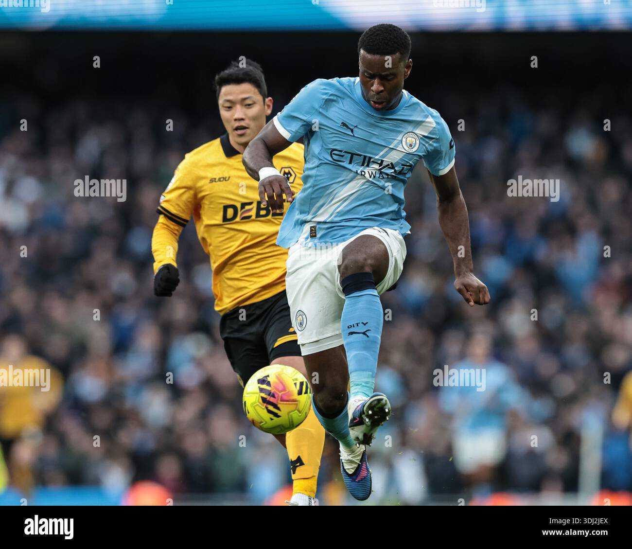 Marc Guehi of Manchester City passers back to Donnarumma during the ...