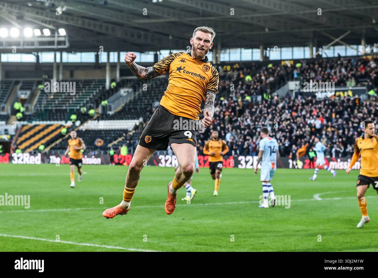 Oliver McBurnie of Hull City celebrates his goal to make it 1-0 during ...
