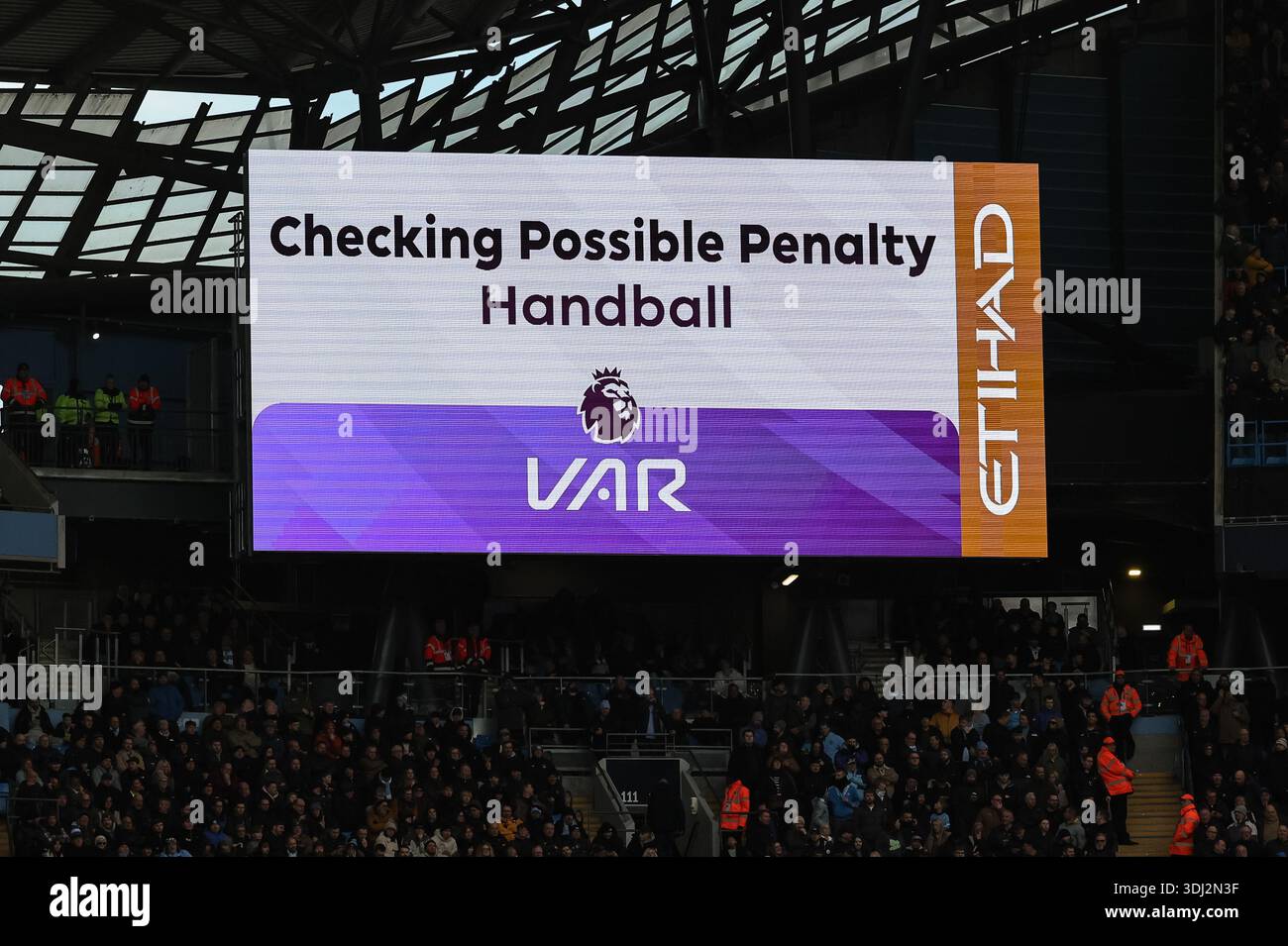 VAR penalty check on Yerson Mosquera of Wolverhampton Wanderers during ...