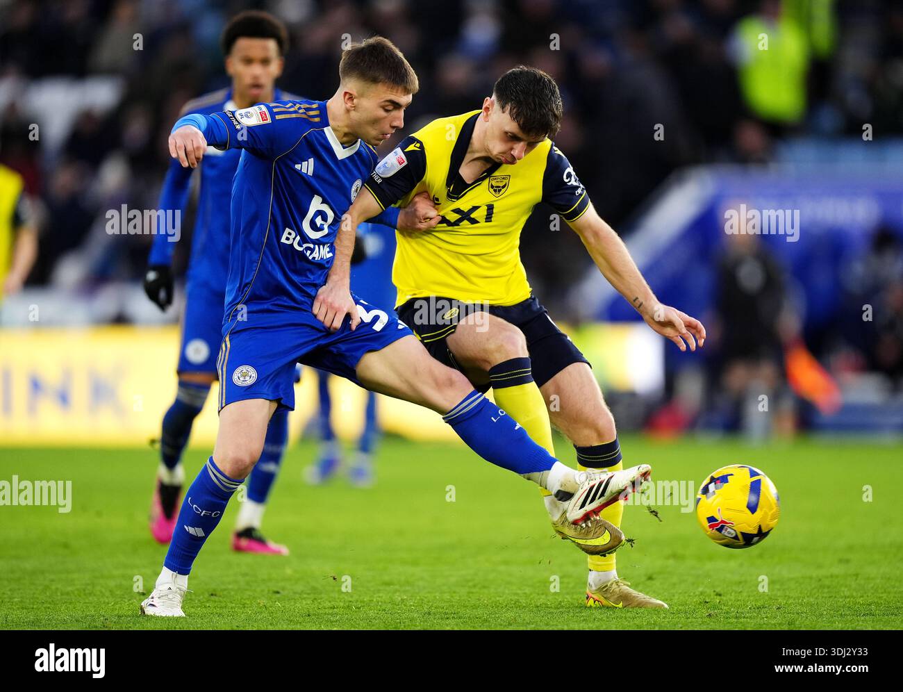Leicester City's Luke Thomas (left) and Oxford United's Mark Harris ...