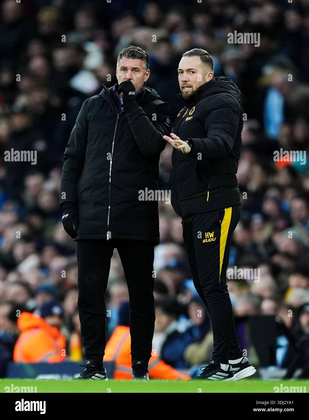 Wolverhampton Wanderers manager Rob Edwards (left) with coach Harry ...