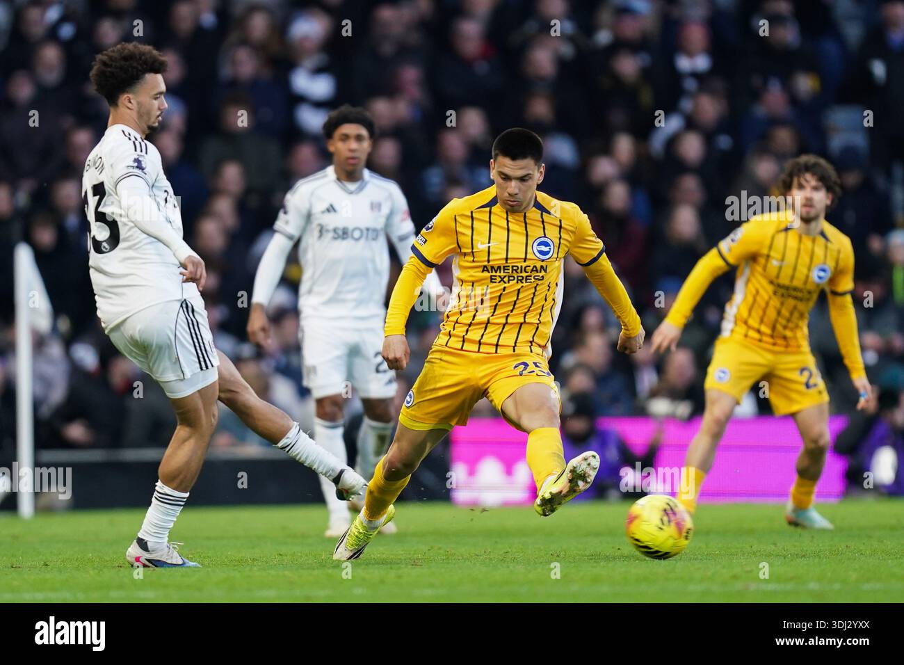 Antonee Robinson of Fulham under pressure from Diego Gómez of Brighton ...