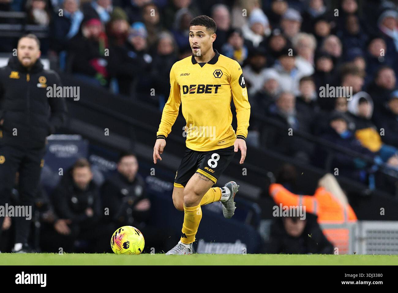 Joao Gomes of Wolverhampton Wanderers runs on the ball during the ...