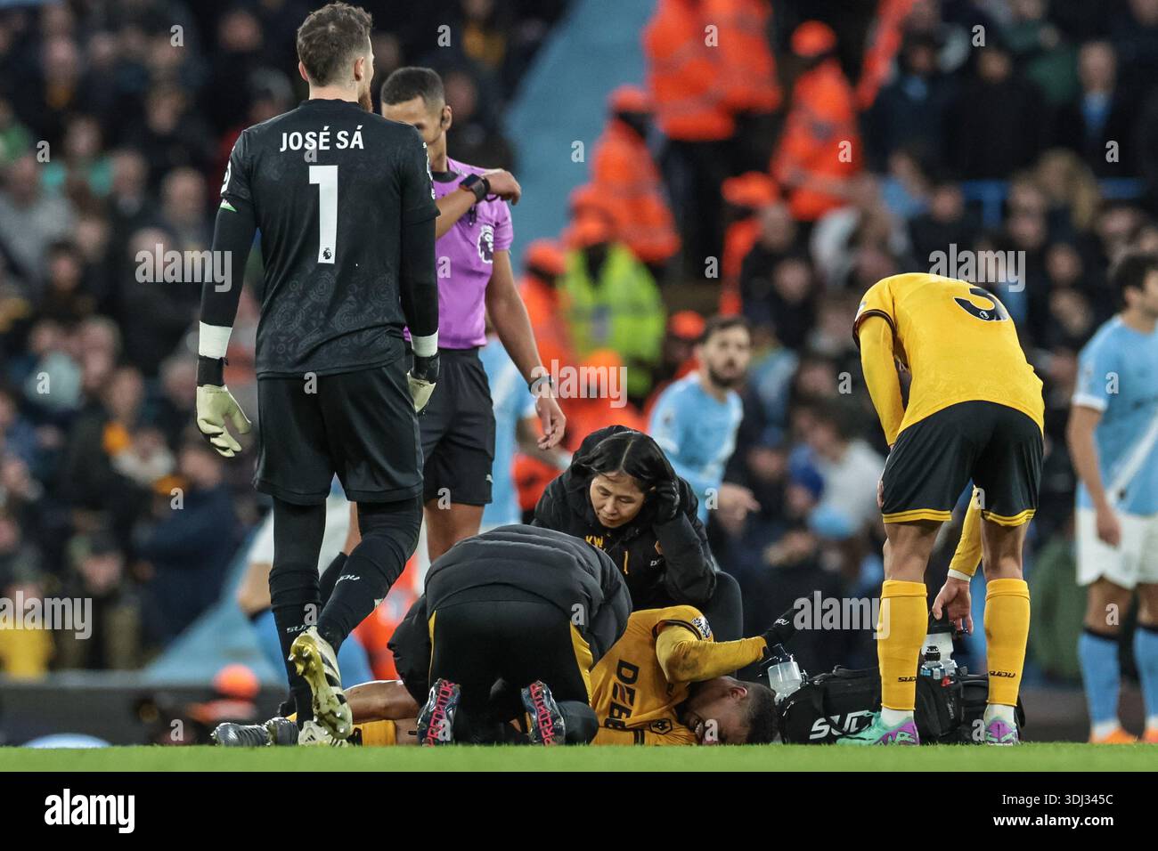 Andre of Wolverhampton Wanderers receives treatment during the Premier ...