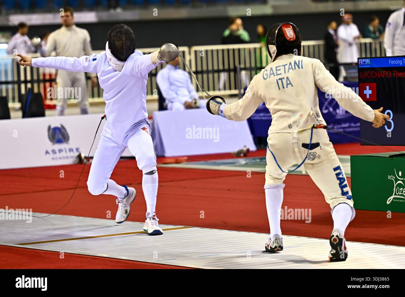 Doha, Qatar. 24th Jan, 2026. Theo Brochard (L) of Switzerland and ...