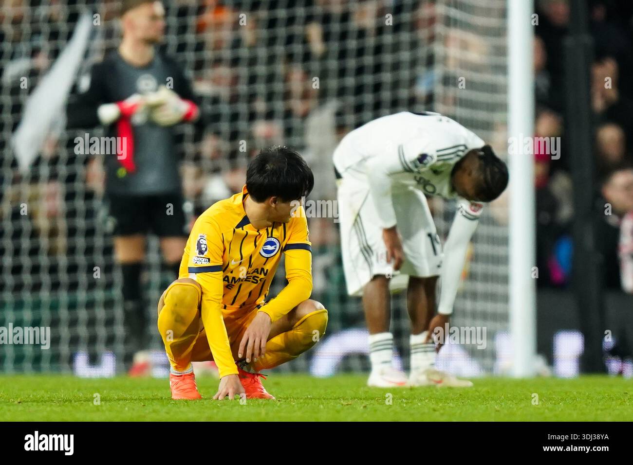 Kaoru Mitoma of Brighton & Hove Albion looks dejected after the Fulham ...