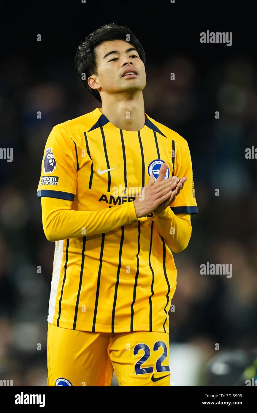Kaoru Mitoma of Brighton & Hove Albion looks dejected while clapping ...