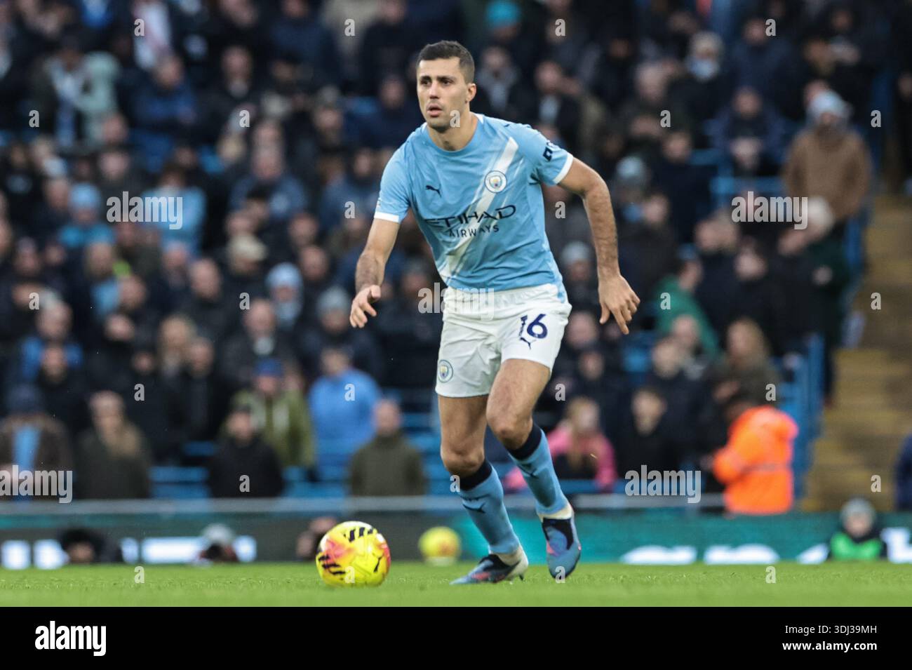 Rodrigo of Manchester City breaks with the ball during the Premier ...