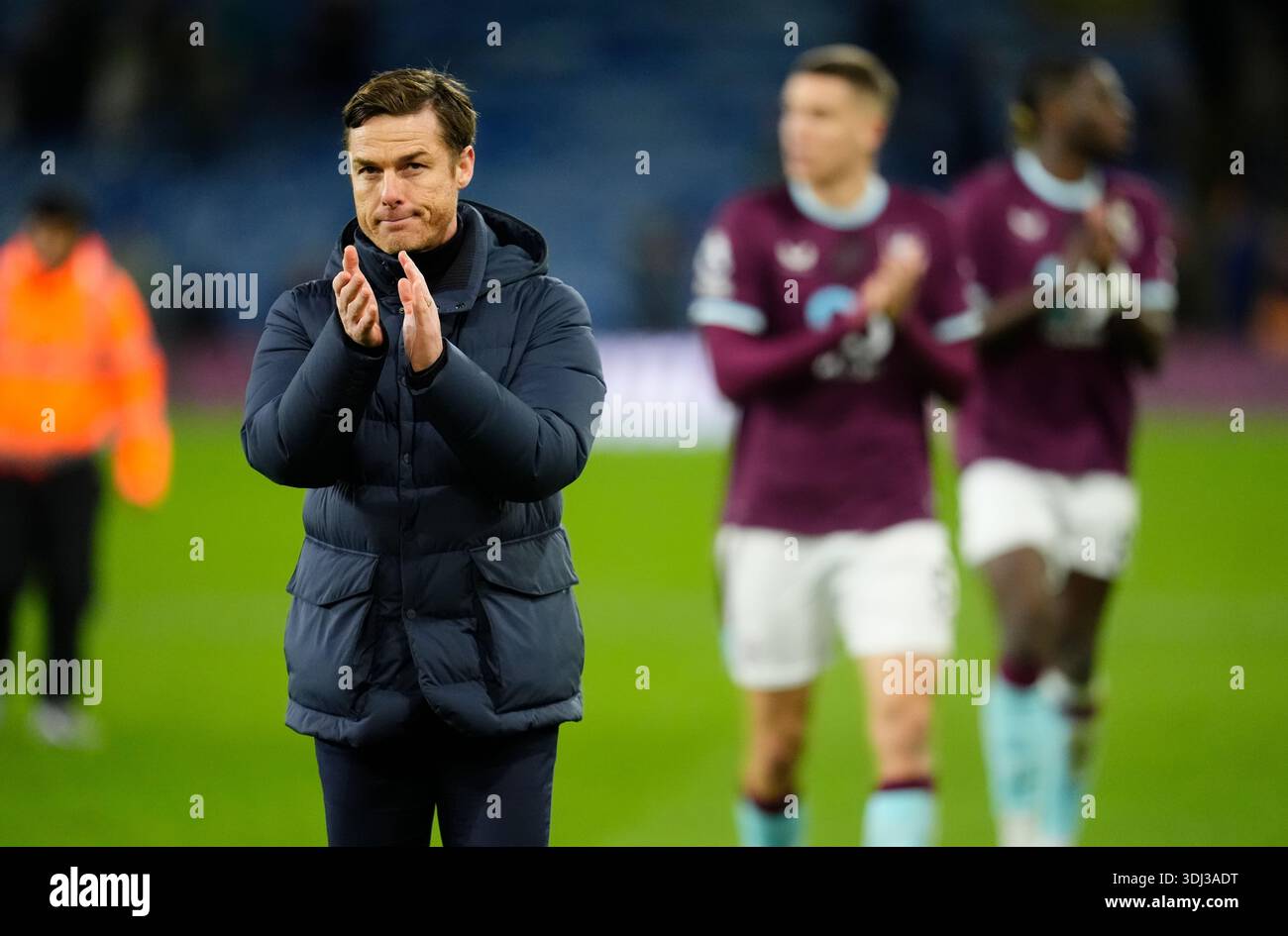 Burnley manager Scott Parker applauds the fans after the Premier League ...