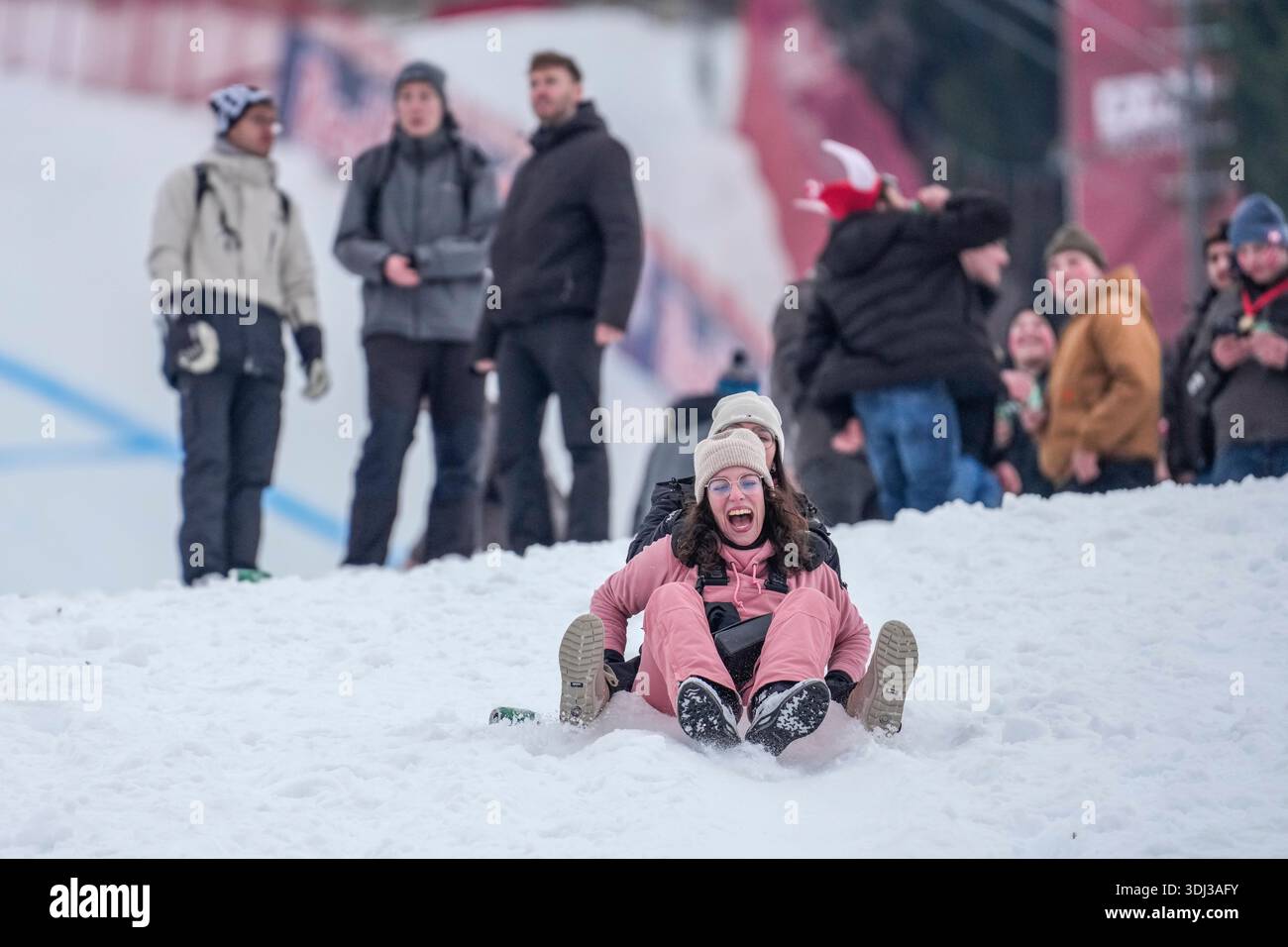 KITZBUEHEL, AUSTRIA - JANUARY 24: Fans moving down the hill during the ...