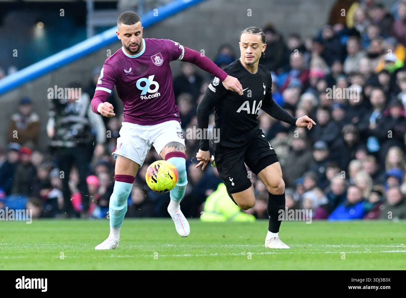 Kyle Walker of Burnley and Xavi Simons of Tottenham Hotspur during the ...