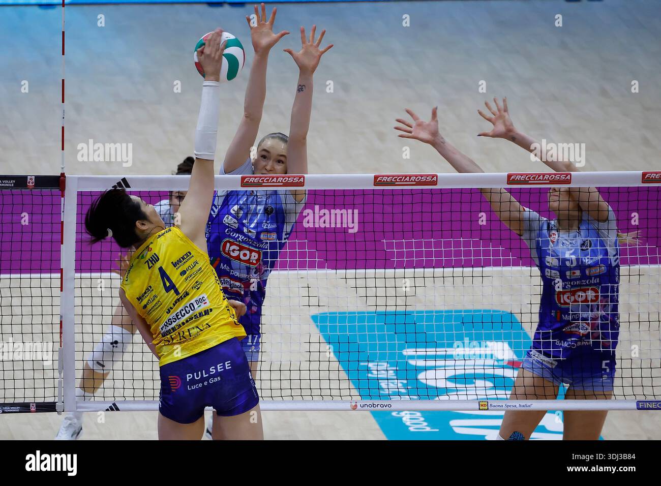 Ting Zhu # 4of Prosecco Doc A. Carraro Imoco Conegliano spikes the ball ...