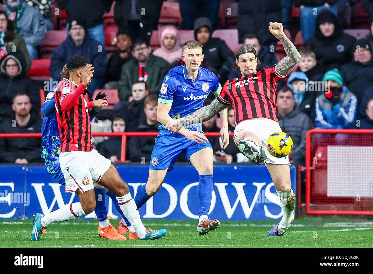 4, Aden Flint of Walsall FC flicks the ball to 6, Priestley Farquharson ...