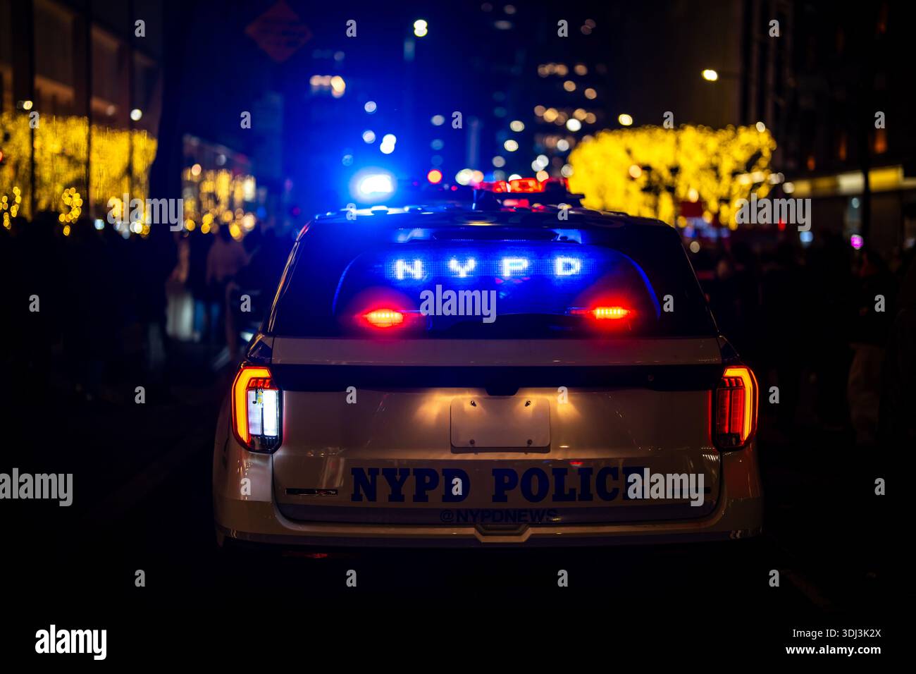 NYPD police car securing area. NYPD police car in night city. NYPD ...