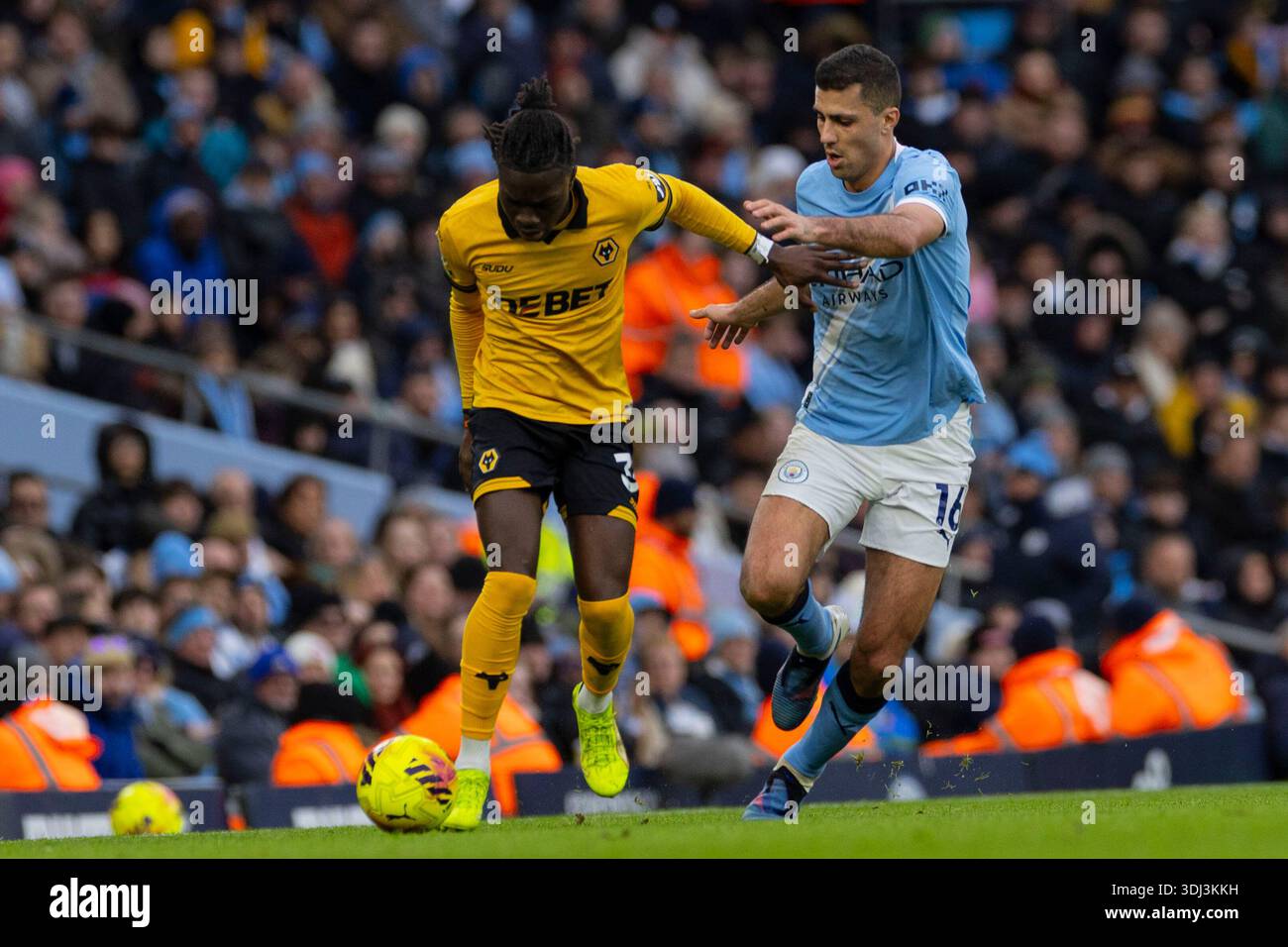 Rodri #16 of Manchester City F.C. challenges the opponent during the ...