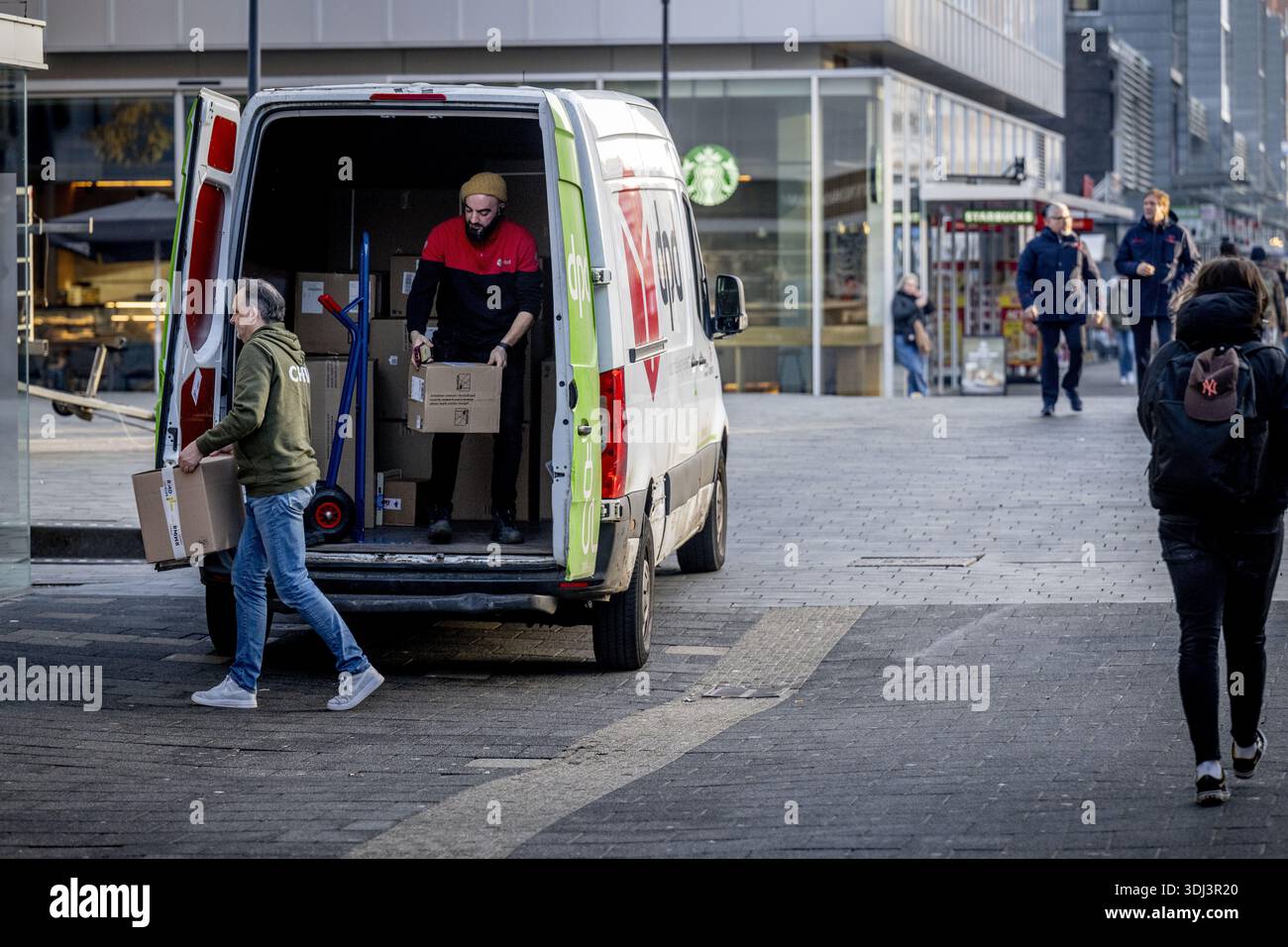 ROTTERDAM - A DDP parcel delivery driver ROBIN UTRECHT /ANP netherlands ...