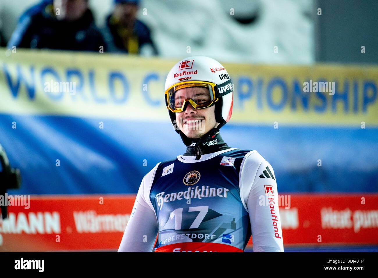 RAIMUND Philipp (Germany) smiles contentedly at the finish line, behind ...