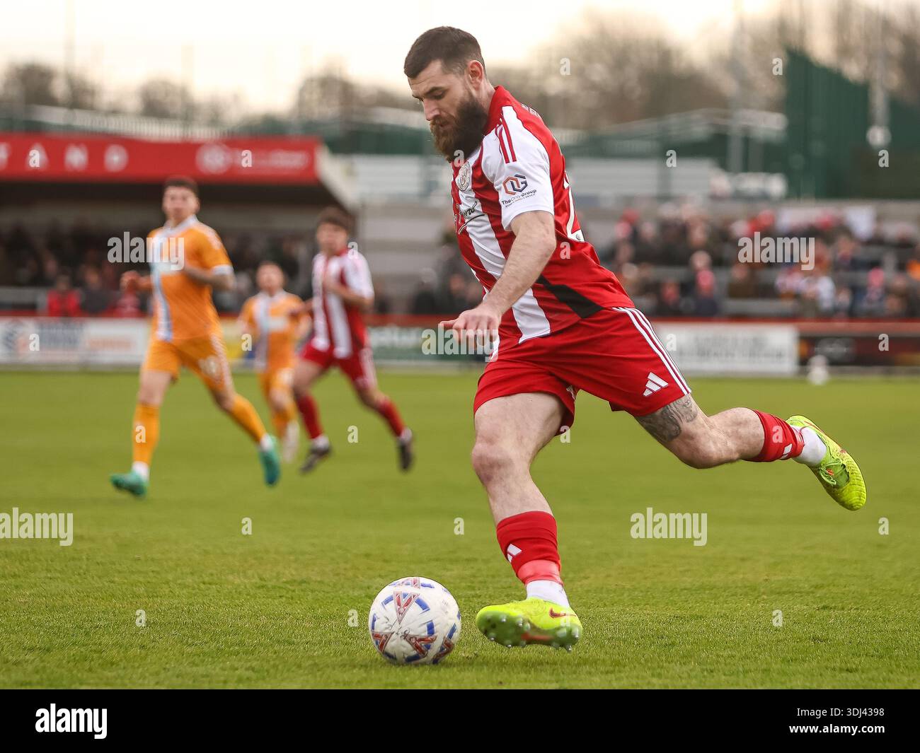 BRACKLEY, ENGLAND - JANUARY 24: Danny Newton of Brackley Town crosses ...