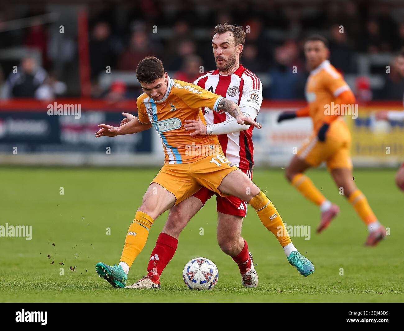 BRACKLEY, ENGLAND - JANUARY 24: Shane Byrne of Brackley Town tackles ...