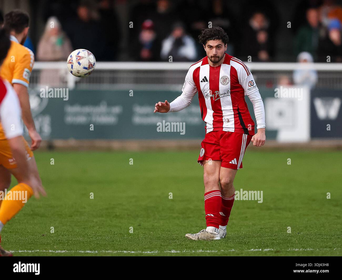 BRACKLEY, ENGLAND - JANUARY 24: Scott Pollock of Brackley Town passes ...