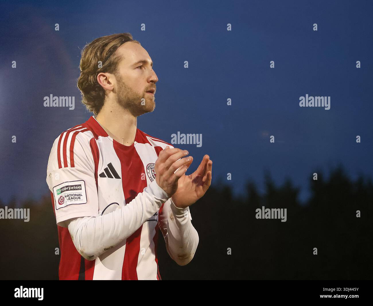 BRACKLEY, ENGLAND - JANUARY 24: Morgan Roberts of Brackley Town claps ...