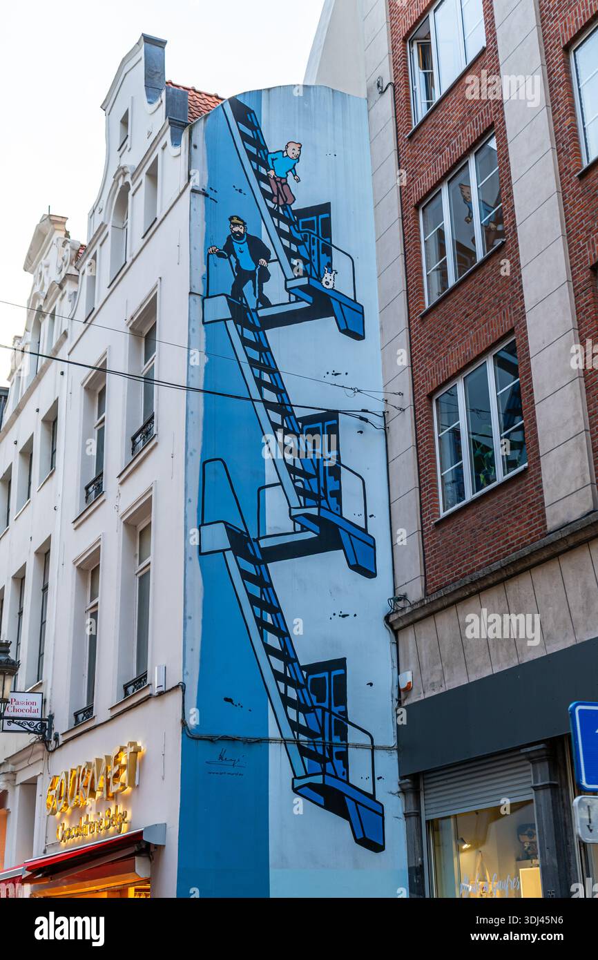Mural of Tintin comic book Captain Haddock and dog Snowball climbing an ...