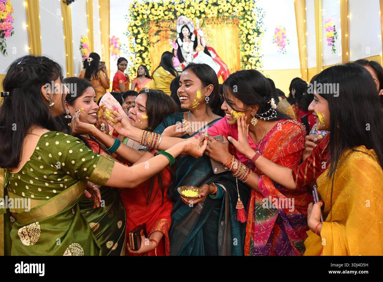 PATNA, INDIA - JANUARY 23: Students applying Abeer-Gulal to each others ...