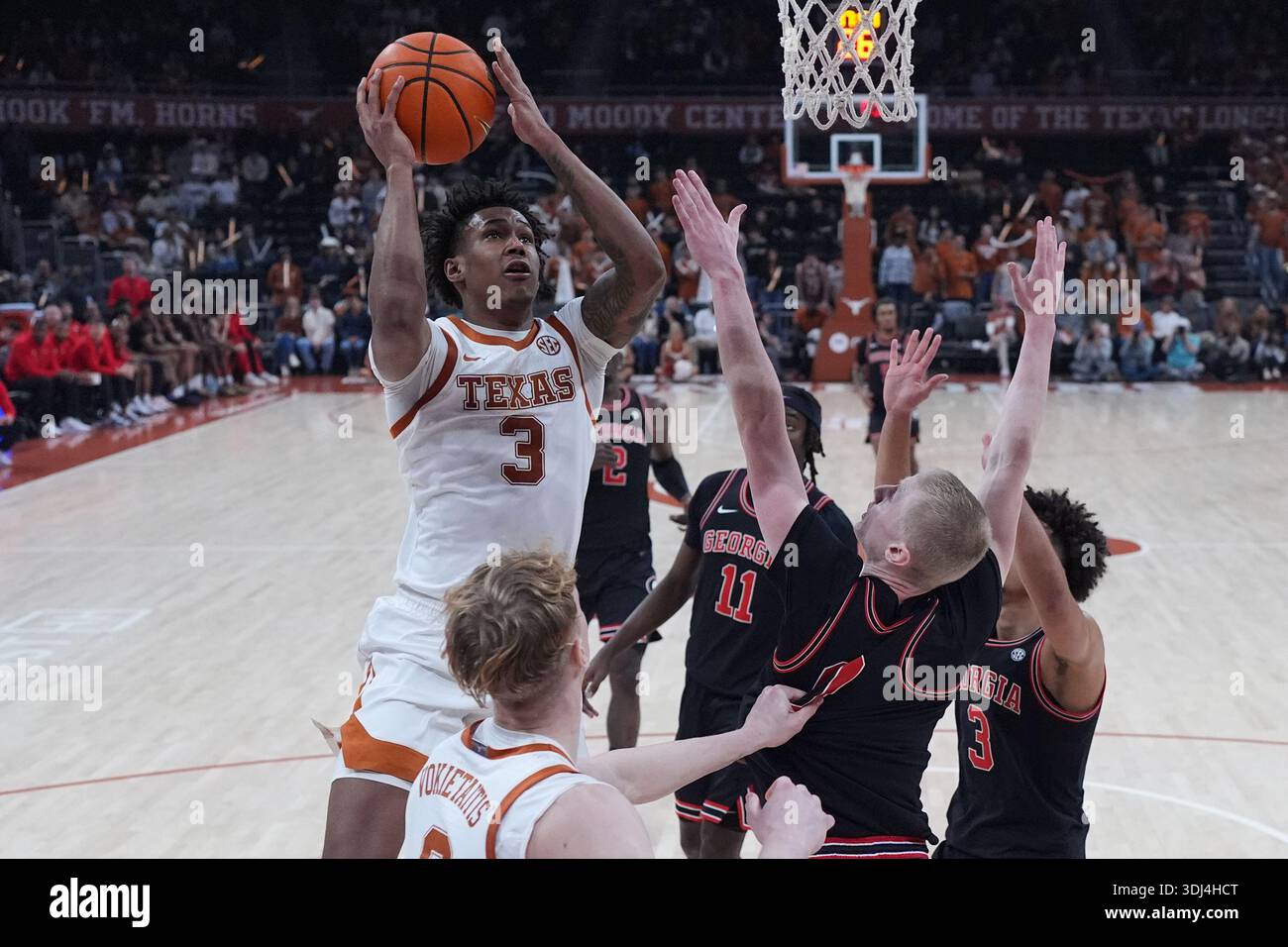 Texas guard Dailyn Swain (3) shoots the ball against Georgia during the ...