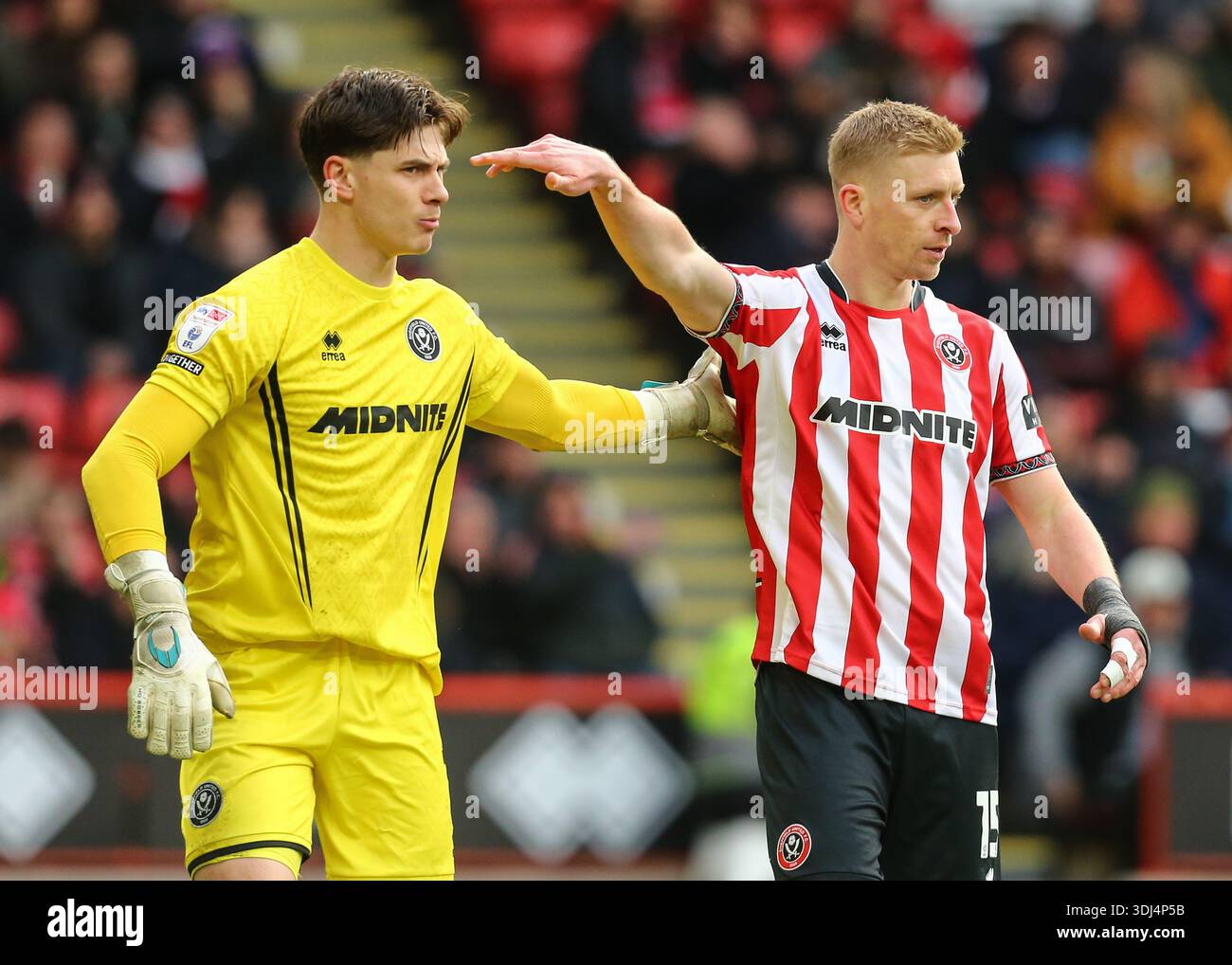 Sheffield United goalkeeper Michael Cooper and Ben Mee of Sheffield ...