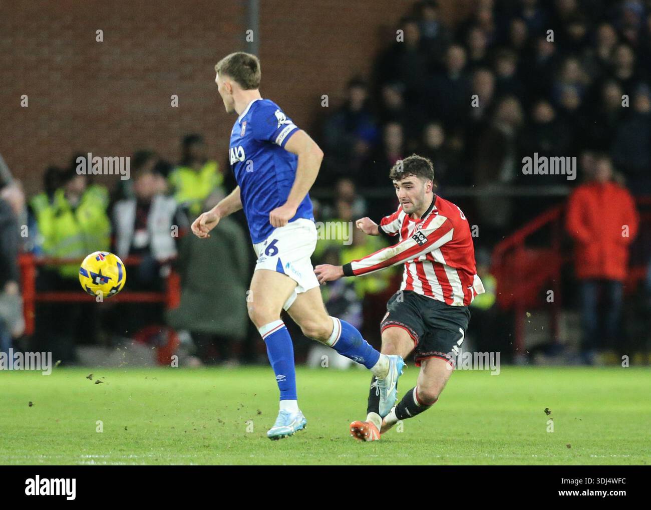 Thomas Cannon of Sheffield United tries a shot from his own half during ...
