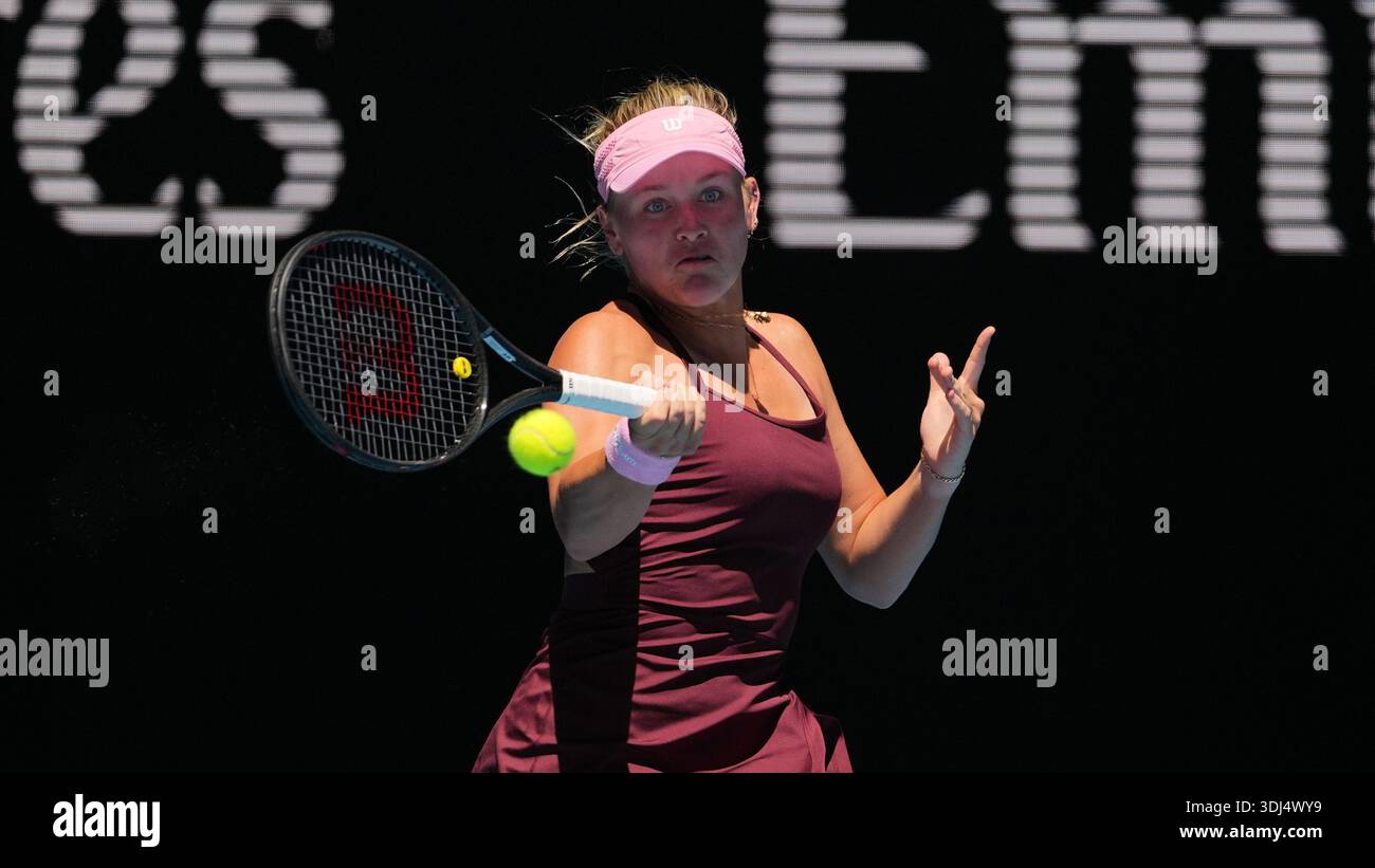 Peyton Stearns of the U.S. plays a forehand return to compatriot Amanda ...