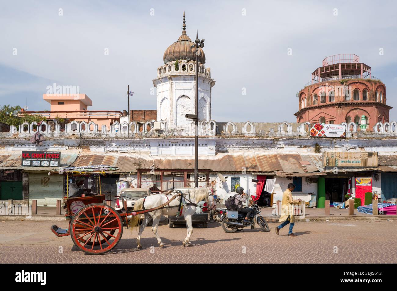 Lucknow, India - March 16, 2024: The image shows a street scene with a ...
