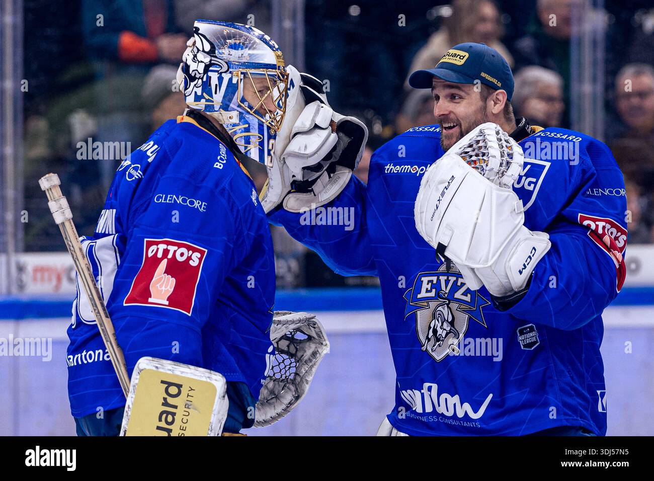 Goaltenders Leonardo Genoni #30 (EV Zug) and Tim Wolf #1 (EV Zug ...