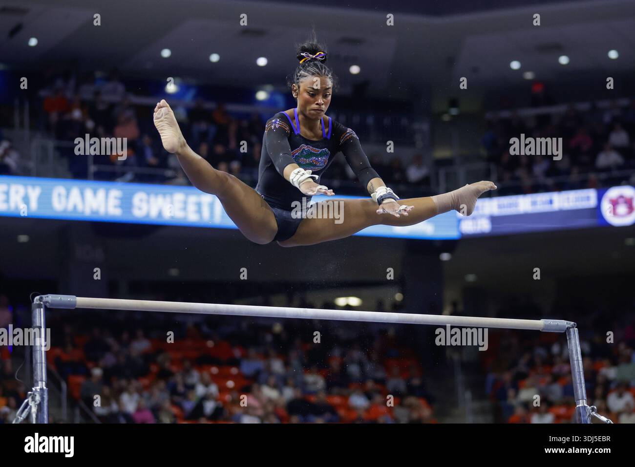 Florida's Selena Harris-Miranda competes on the uneven bars during an ...