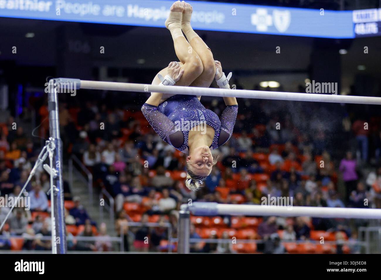 Auburn's Marissa Neal competes on the uneven bars during an NCAA ...