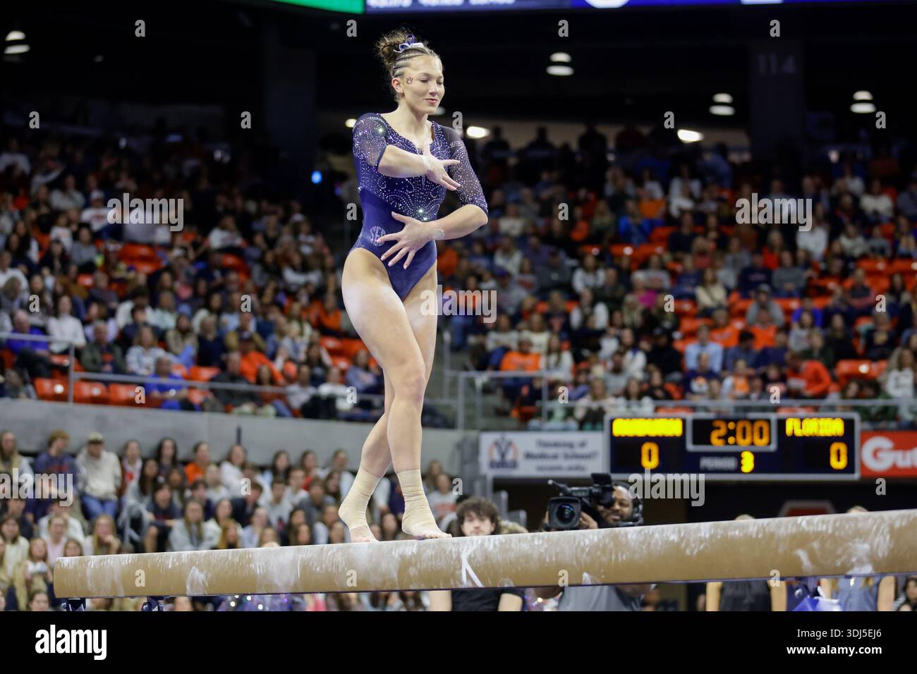 Auburn's Alex Irvine competes on the balance beam during an NCAA ...
