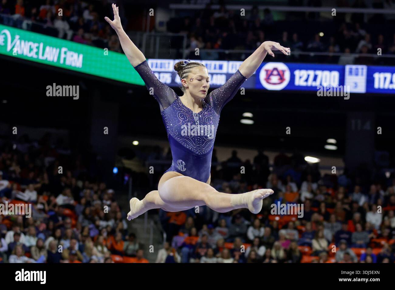 Auburn's Alex Irvine competes on the balance beam during an NCAA ...
