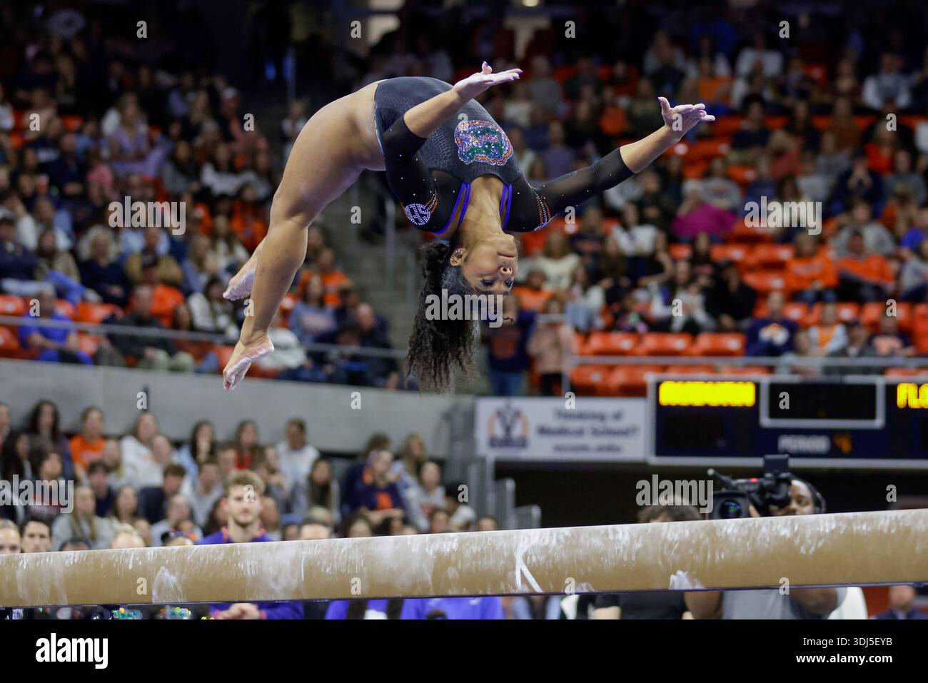 Florida's eMjae Frazier competes on the balance beam during an NCAA ...